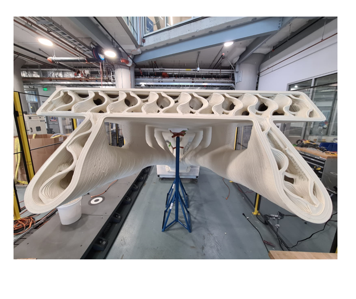 Engineering a bridge that designs and builds itself