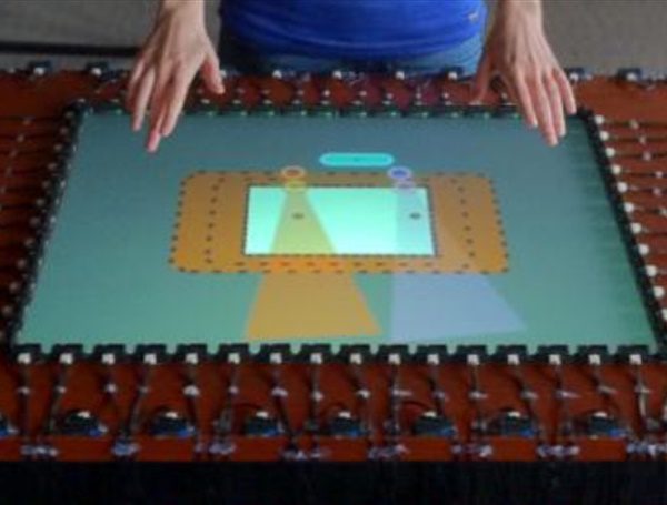 Medusa: A Proximity-Aware Multi-touch Tabletop